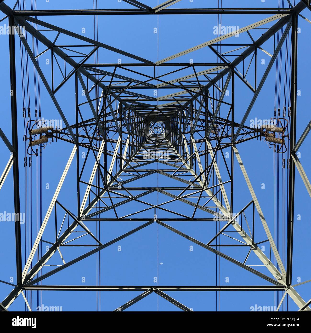 Electricity pylon from below Stock Photo - Alamy