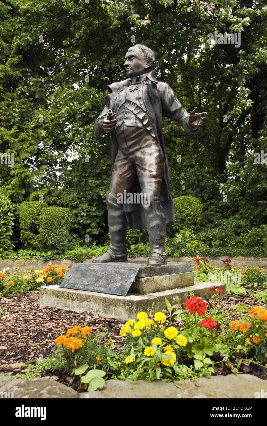 A statue of Napoleon stands behind the house that was his headquarters ...
