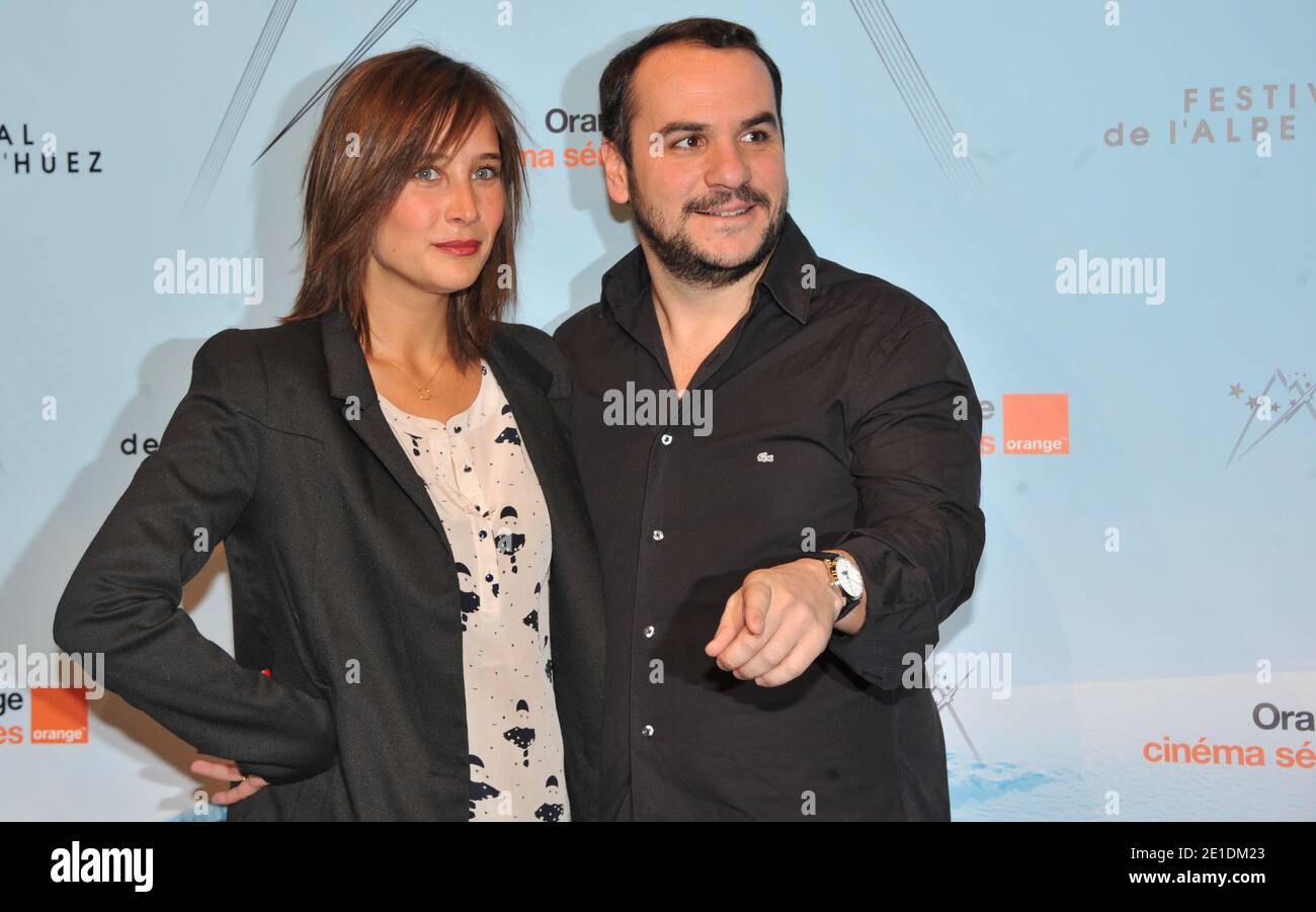 Julie de Bona and Francois-Xavier Demaison posing at a photocall during ...