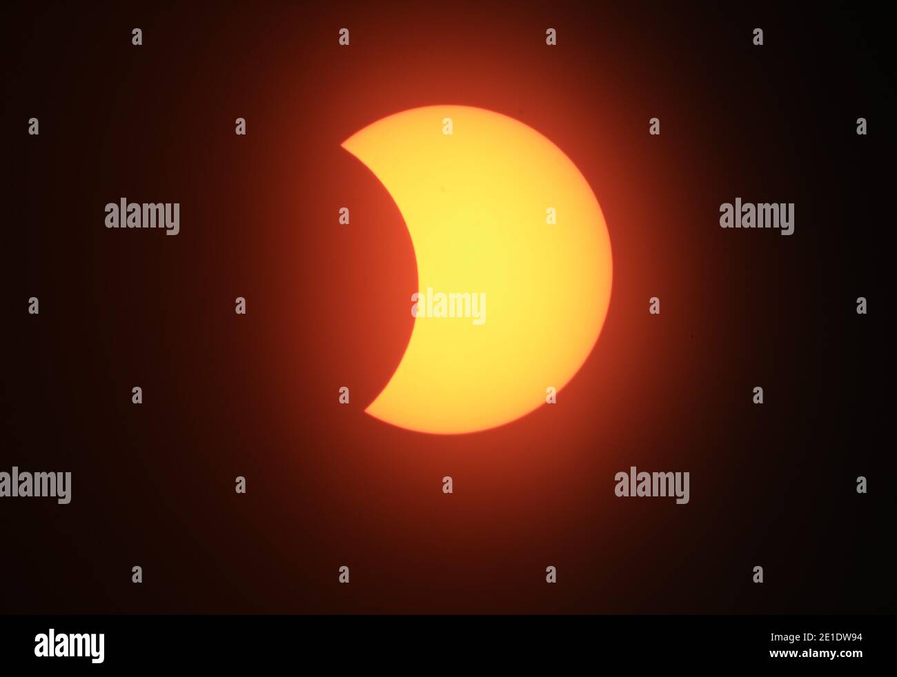Partial solar eclipse Stock Photo - Alamy