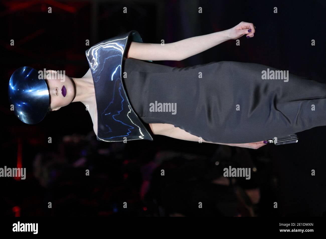 A model displays a creation by Italian designer Georgio Armani for ...