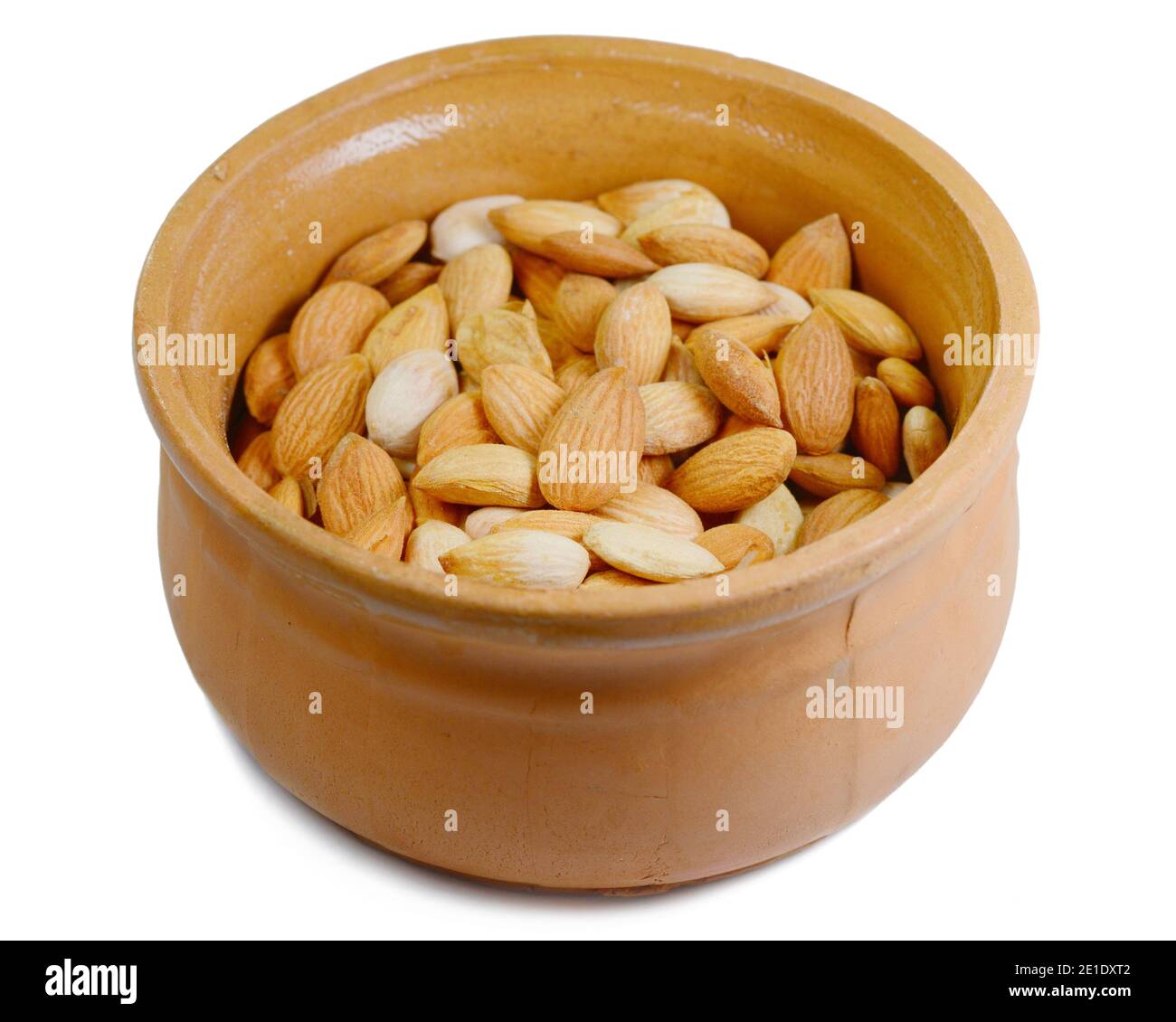 Almonds in a bowl isolated on white background Stock Photo - Alamy