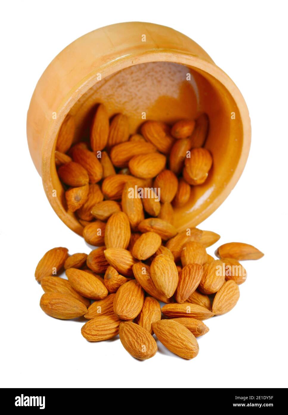 Almonds in a bowl isolated on white background Stock Photo - Alamy