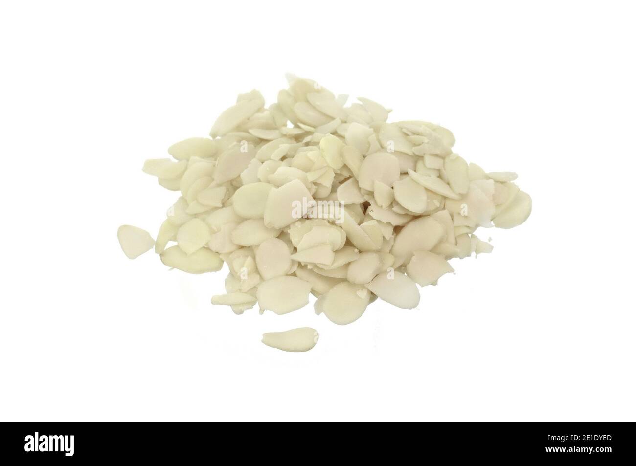 Pile of peeled flaked almonds isolated on white. Blanched almonds ...