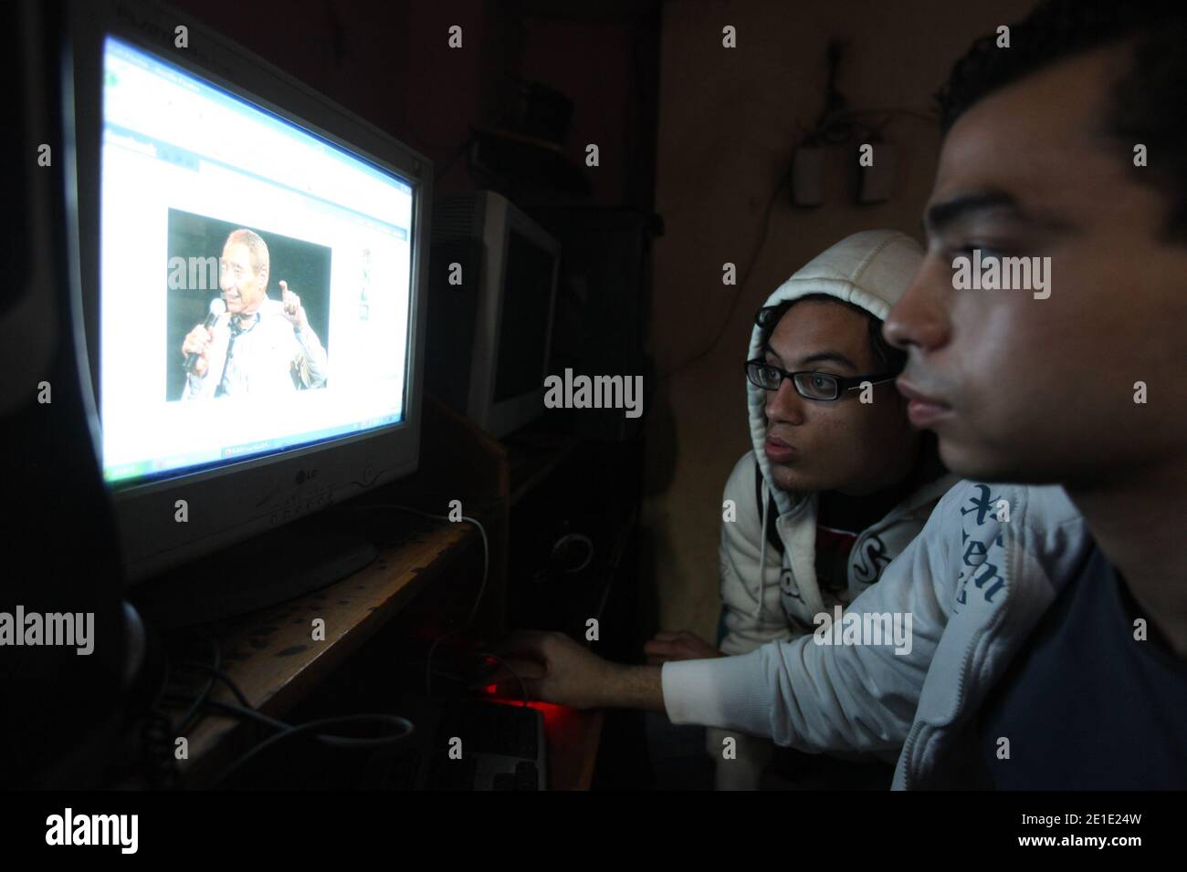 Students look at Facebook pages relating the Egyptian demonstrations at ...