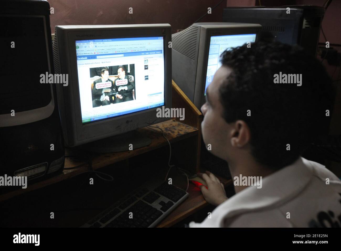 Students look at Facebook pages relating the Egyptian demonstrations at ...