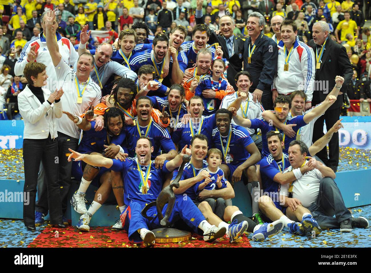 The team of France celebrate there gold medal with their trophy after ...