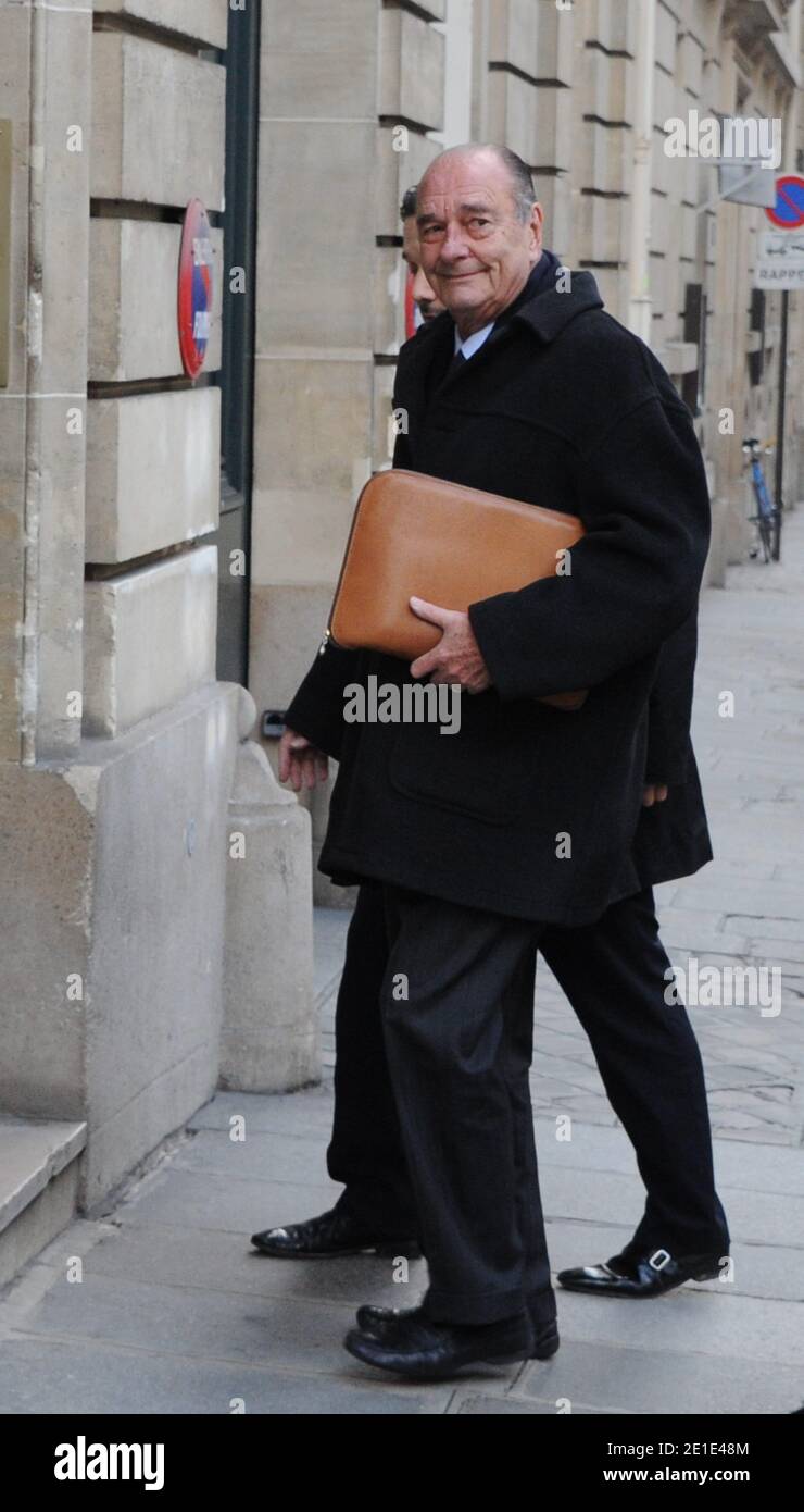 Former President Jacques Chirac arrives at his office on Lille Street ...