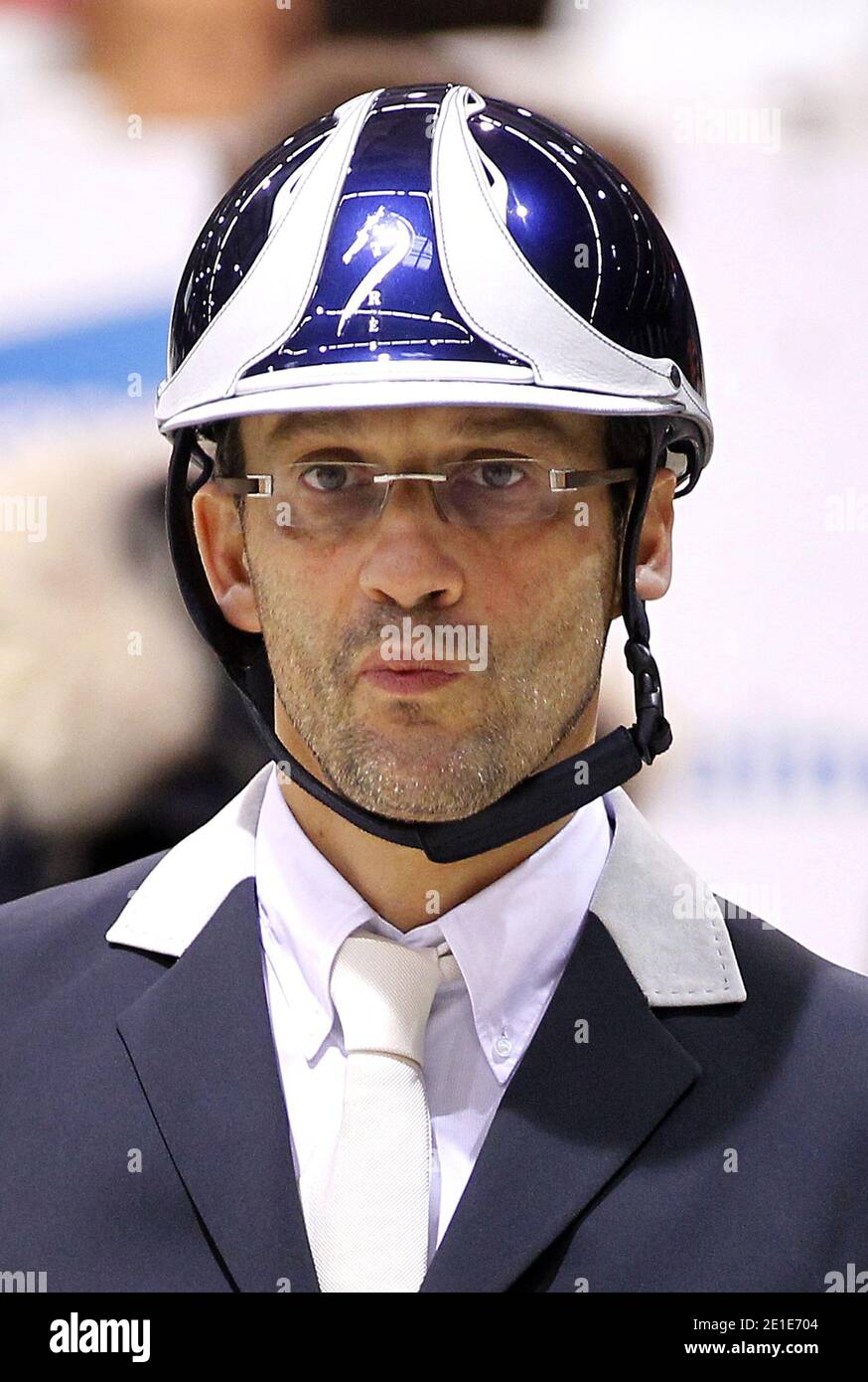 French TV presenter Julien Courbet competes with his horse 'Fivaro' in ...