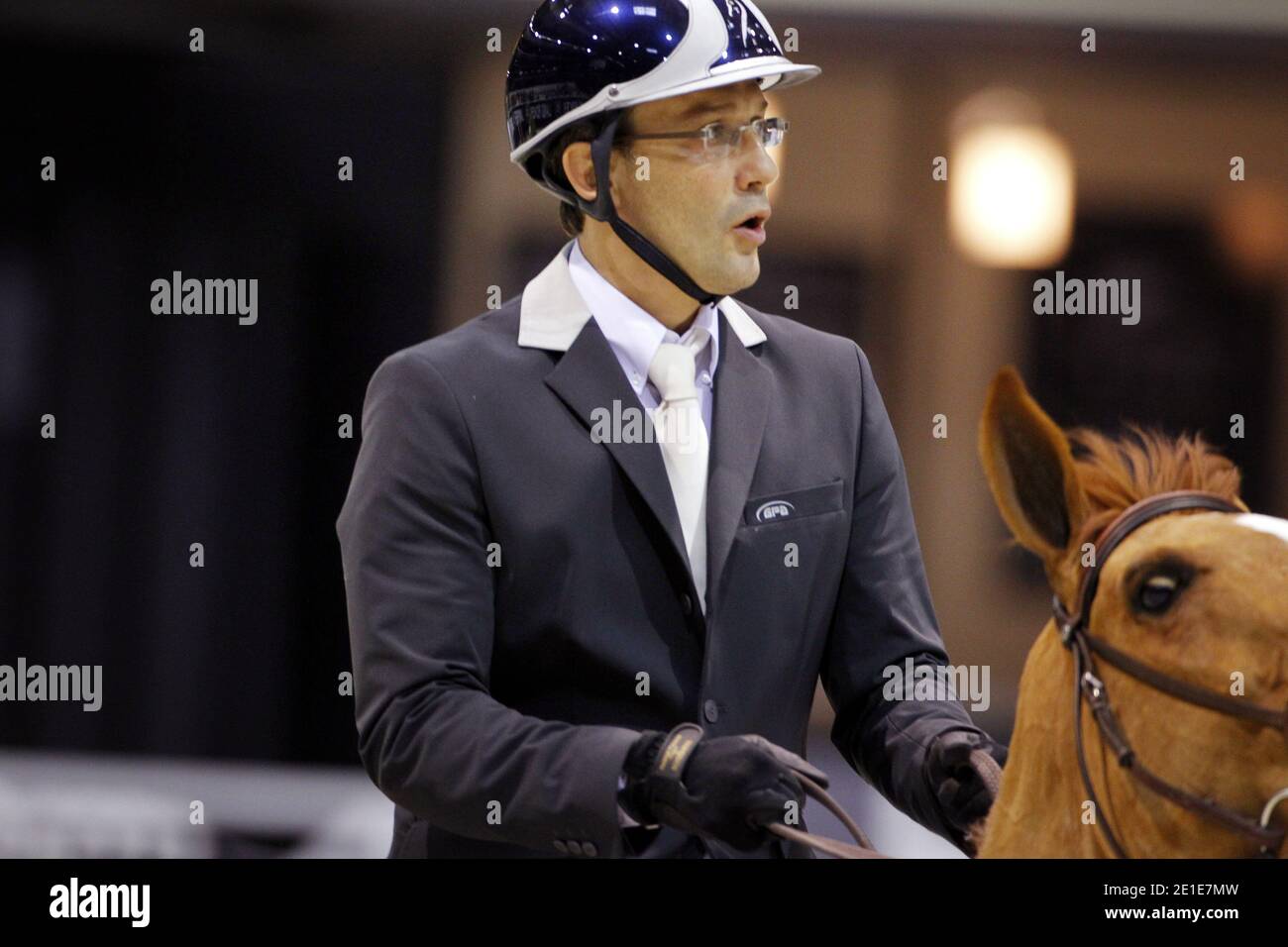 French TV presenter Julien Courbet competes with his horse 'Fivaro' in ...