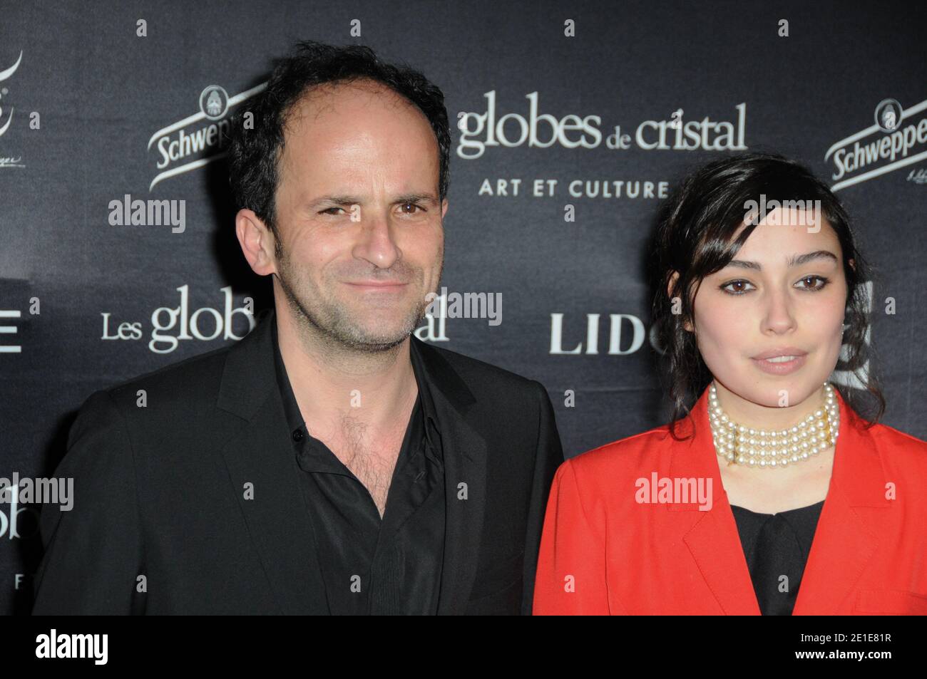 Lionel Abelanski and Alka Balbir arriving to the Globes de Cristal ...
