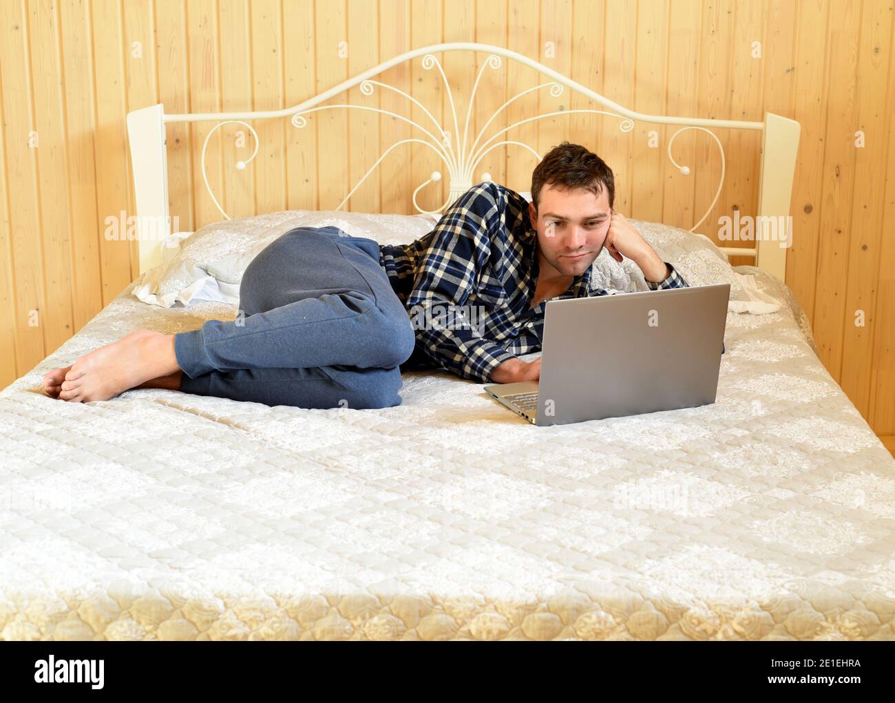 Man lying on bed hi-res stock photography and images - Alamy
