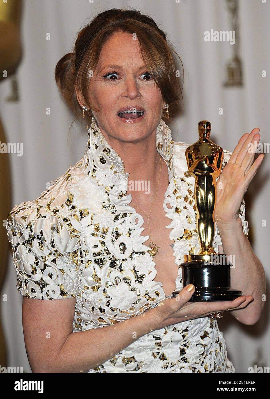 Academy award winner Melissa Leo poses in the press room with her Oscar for best actress in a ...