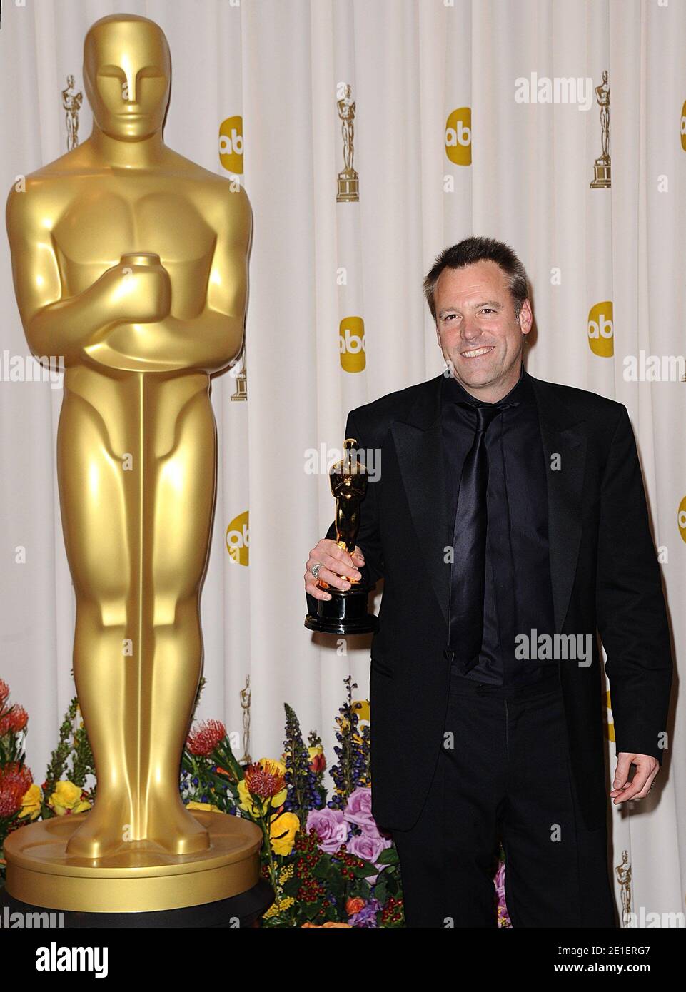 Academy award winner Wally Pfister poses in the press room with the ...