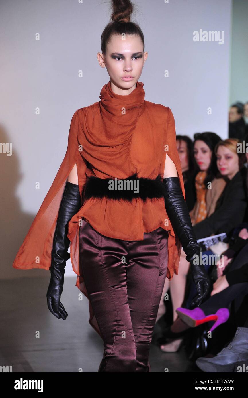 A model displays a creation designed by Harry Halim for his Fall-Winter ...