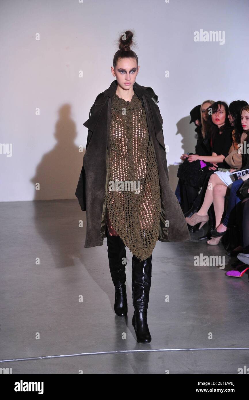 A model displays a creation designed by Harry Halim for his Fall-Winter ...