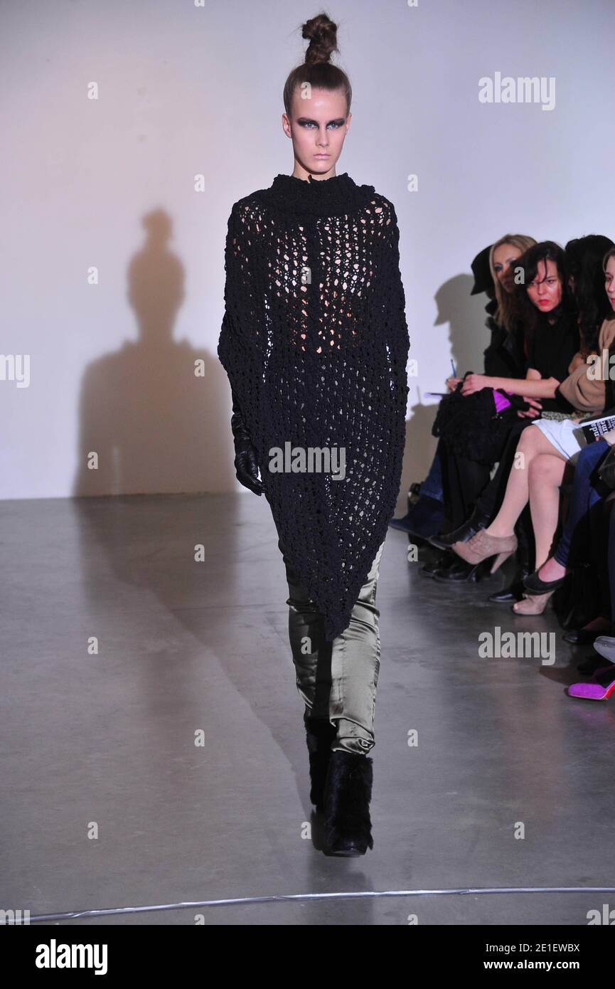 A model displays a creation designed by Harry Halim for his Fall-Winter ...