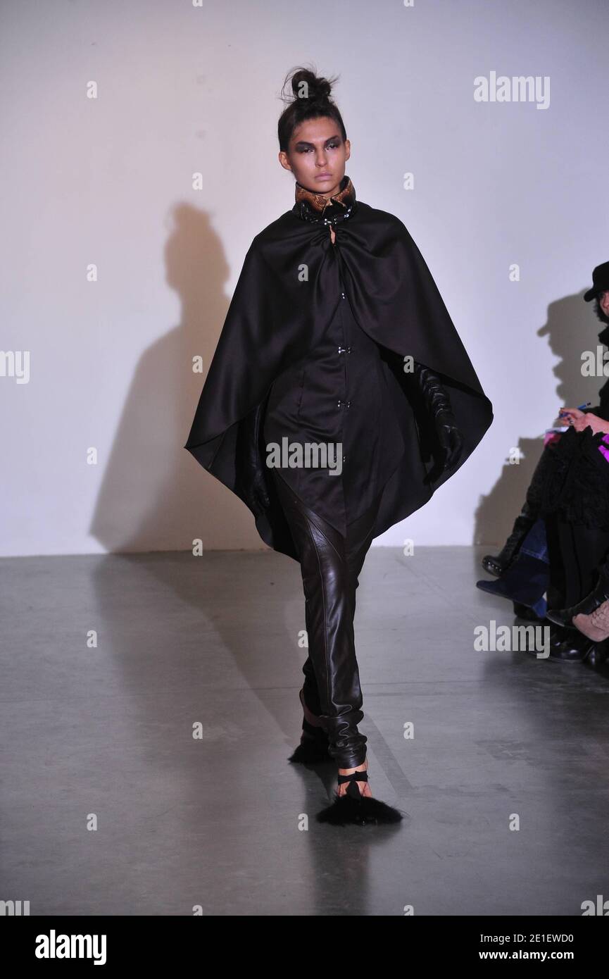 A model displays a creation designed by Harry Halim for his Fall-Winter ...