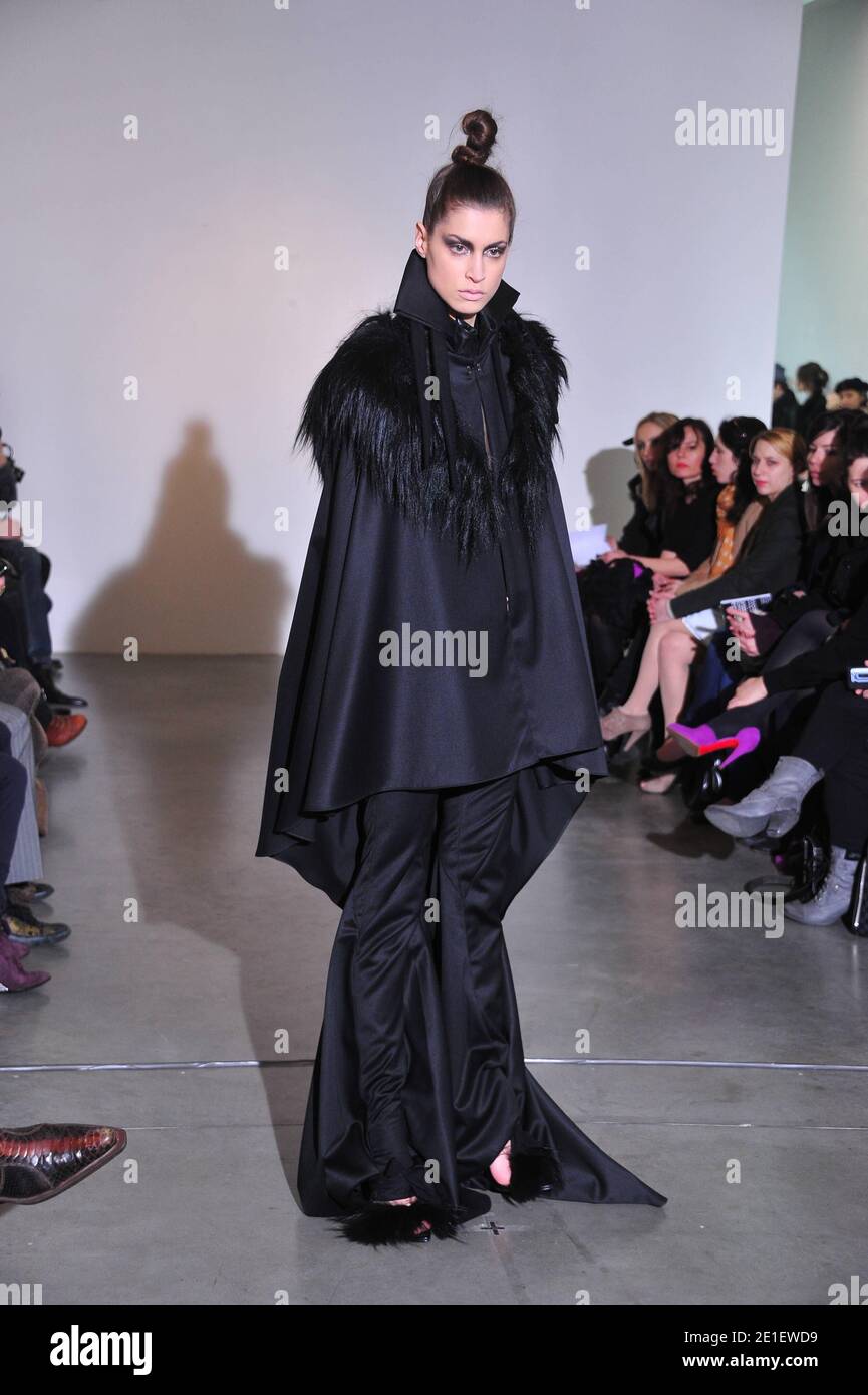 A model displays a creation designed by Harry Halim for his Fall-Winter ...