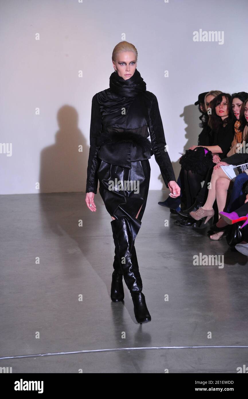 A model displays a creation designed by Harry Halim for his Fall-Winter ...
