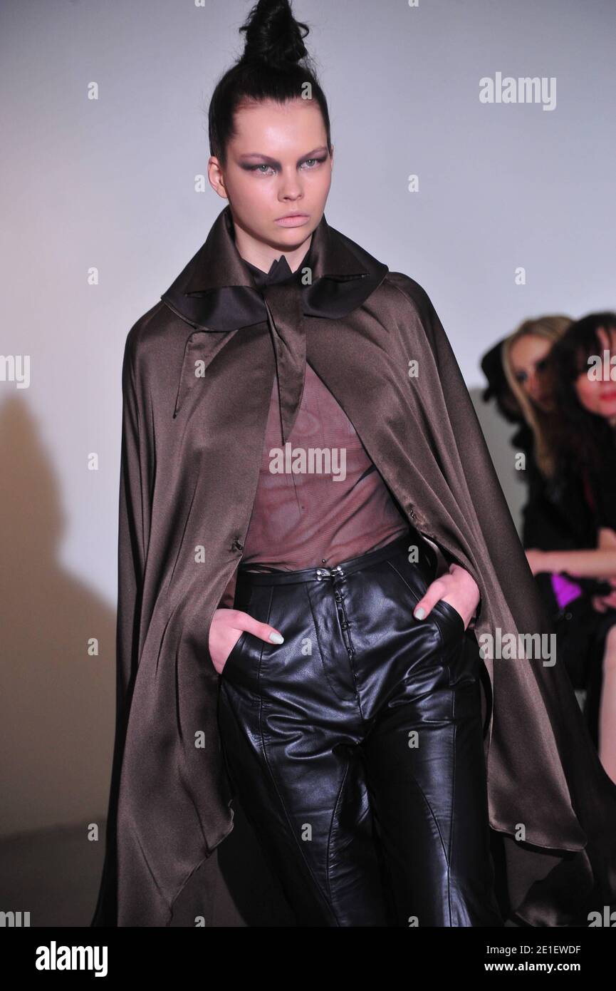 A model displays a creation designed by Harry Halim for his Fall-Winter ...