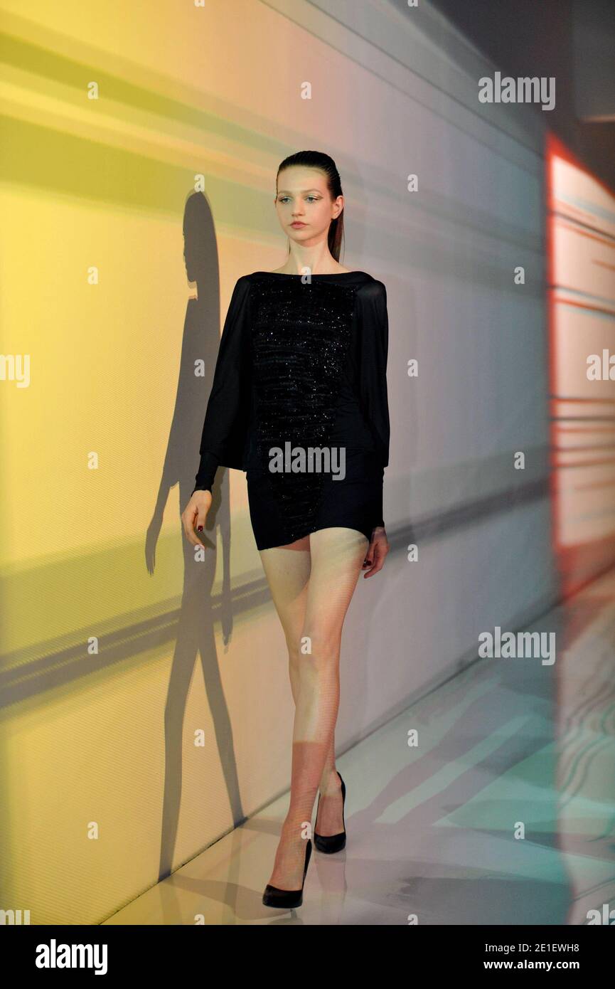 A model displays a creation designed by Anthony Vaccarello for his Fall ...