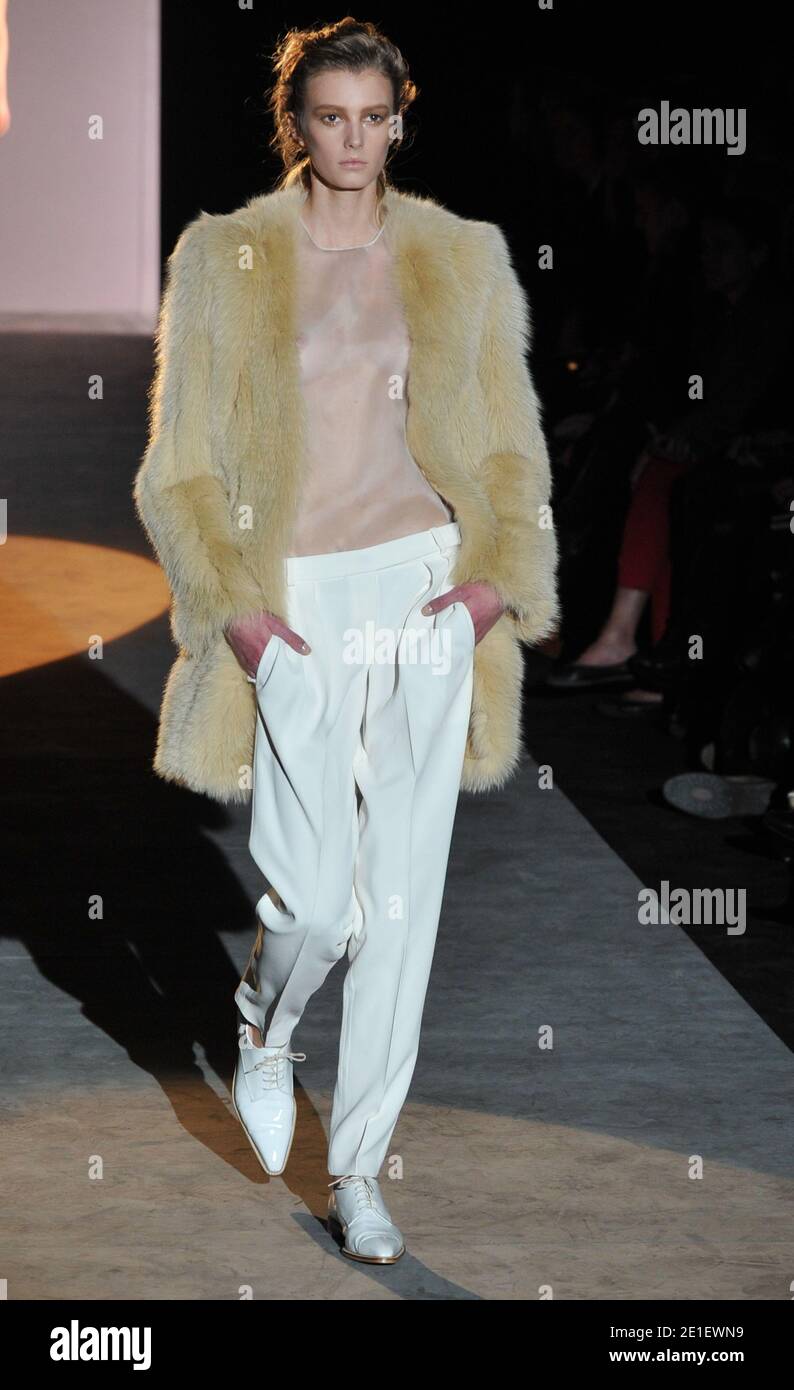 A model displays a creation designed by Hakaan for his Fall-Winter 2011 ...