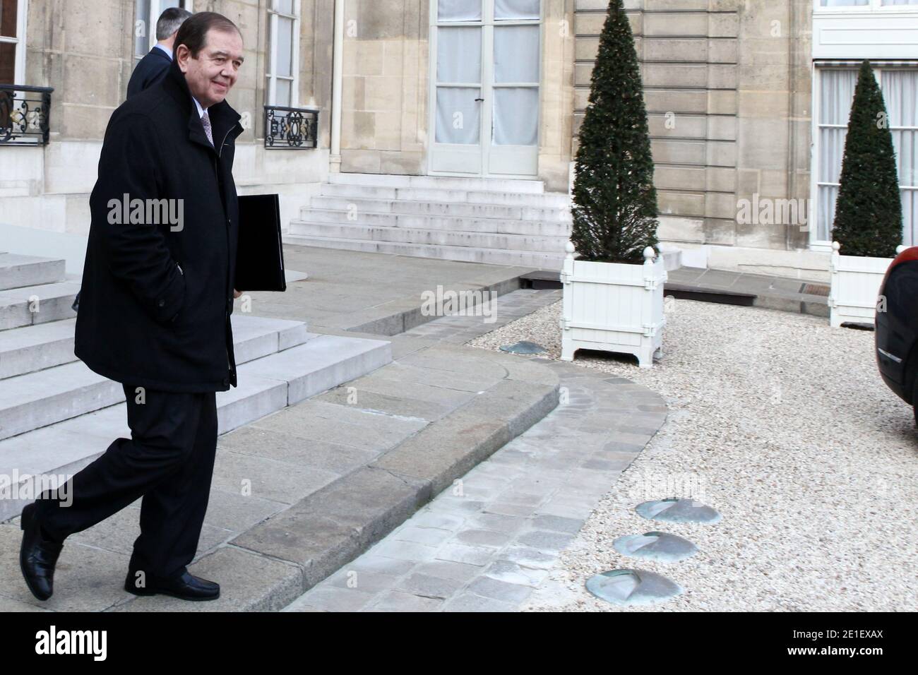 French Minister for Relations with Parliament Patrick Ollier leaves ...