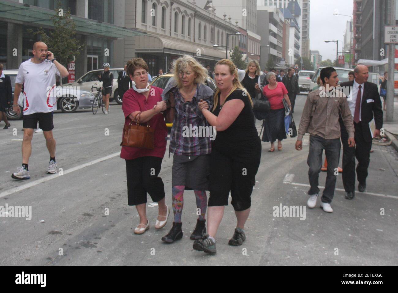 Emergency services and volunteers rescue people from the collapsed CTV ...