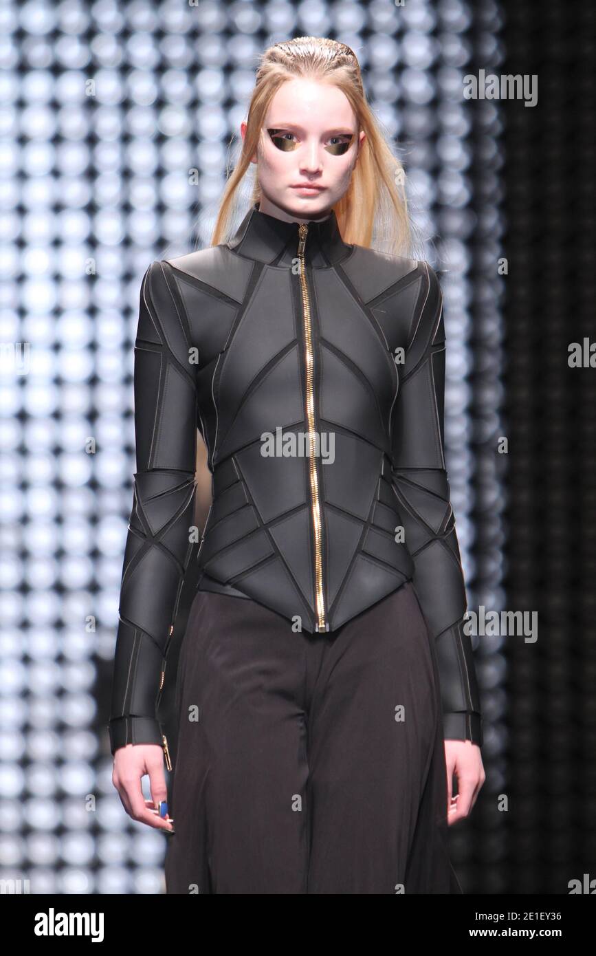 A model displays a creation designed by British Designer Gareth Pugh ...