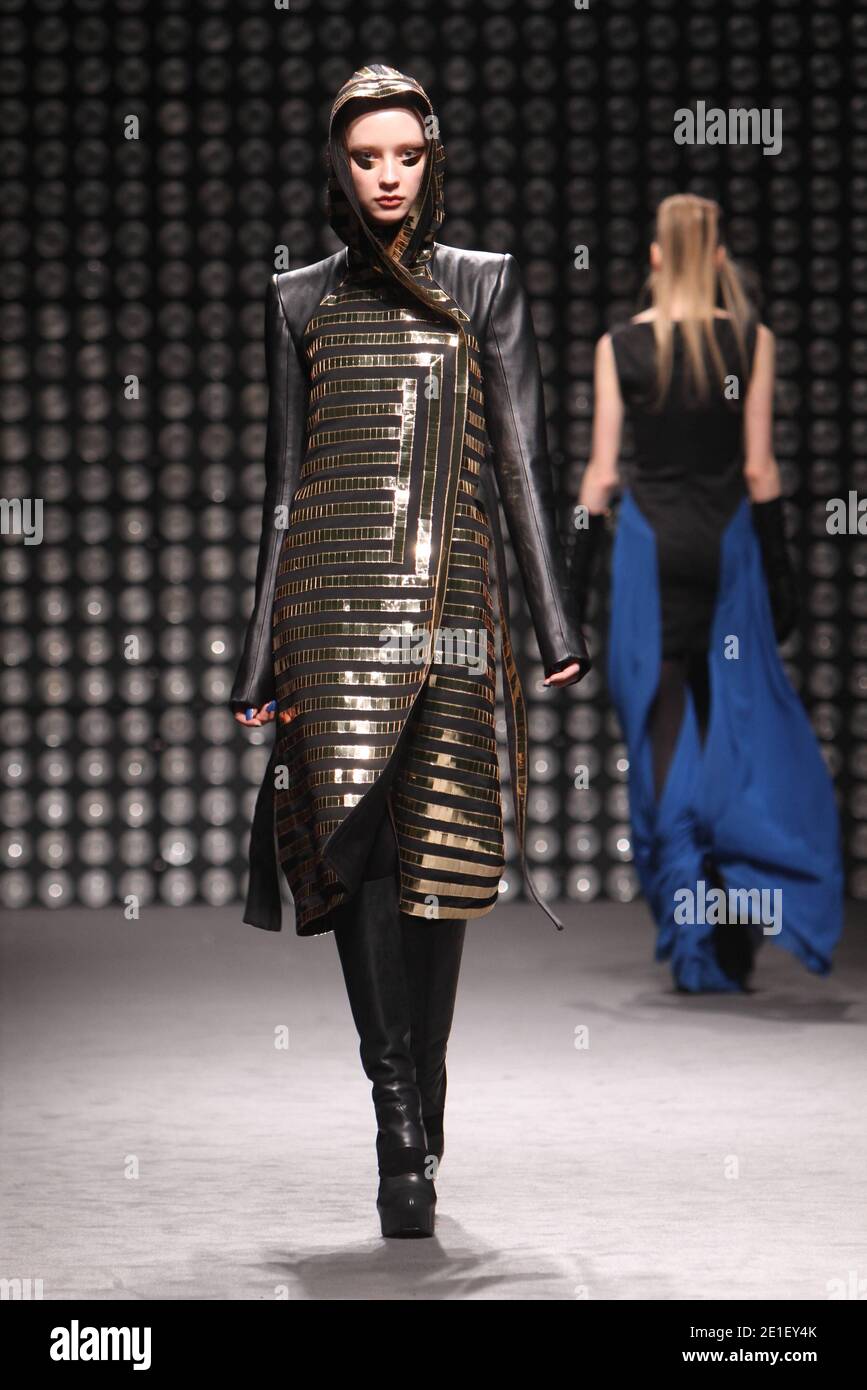 A model displays a creation designed by British Designer Gareth Pugh ...