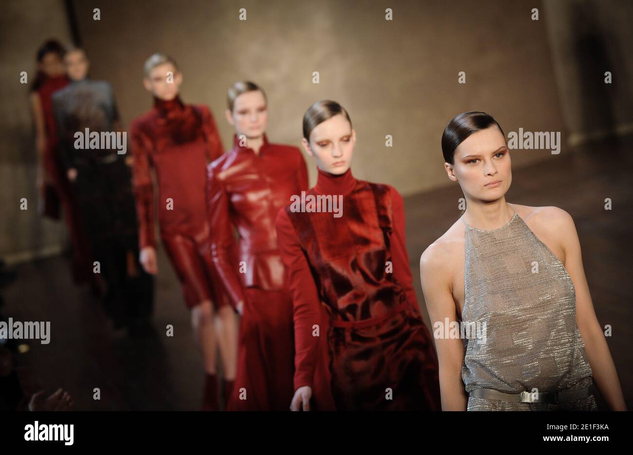 A model displays a creation designed by Alber Kriemler for Akris Fall ...