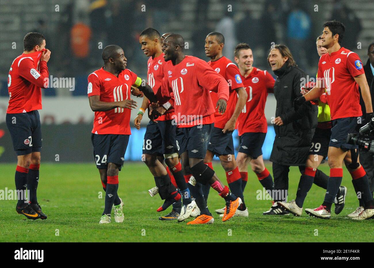 LOSC's players celebrate after winning the French First League soccer ...