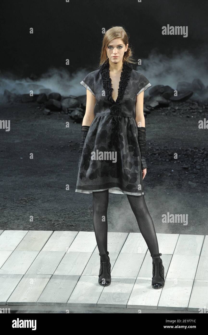 A model displays a creation designed by Karl Lagerfeld for Chanel Fall ...