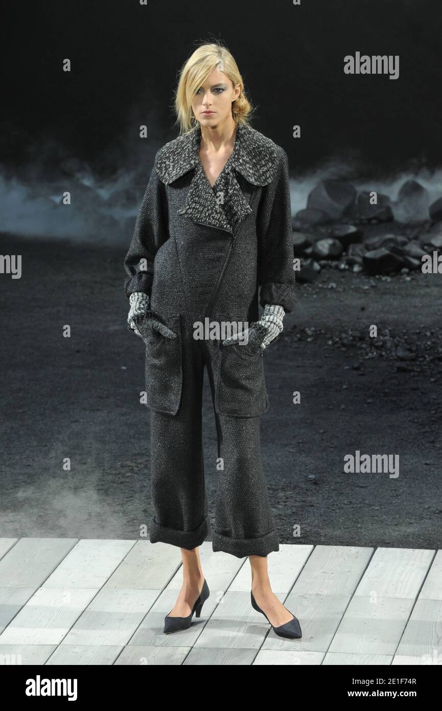 A model displays a creation designed by Karl Lagerfeld for Chanel Fall ...
