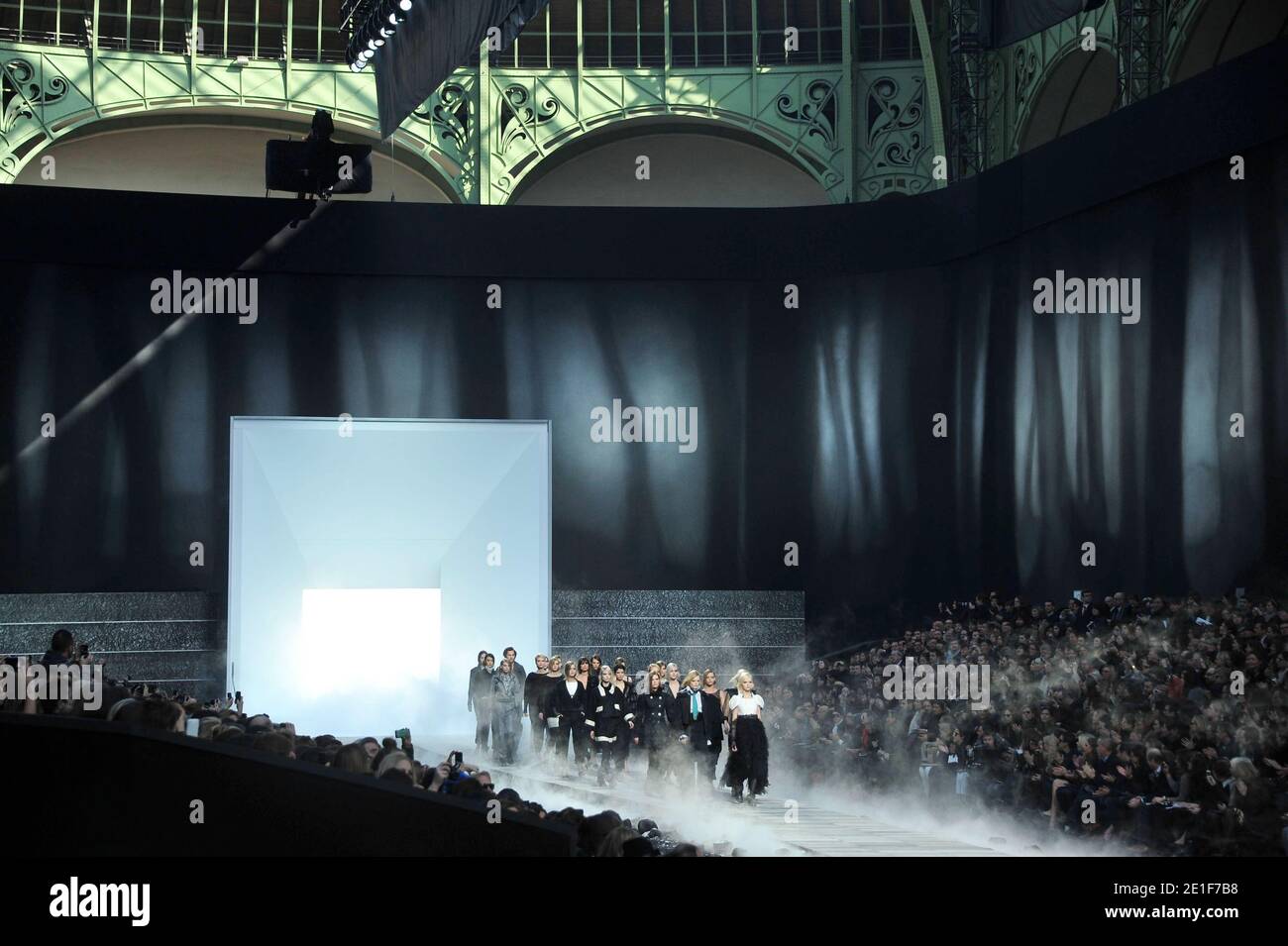 Models diplay creations designed by Karl Lagerfeld for Chanel Fall ...