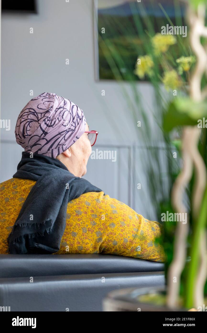 an oncology patient waits in the waiting room Stock Photo - Alamy