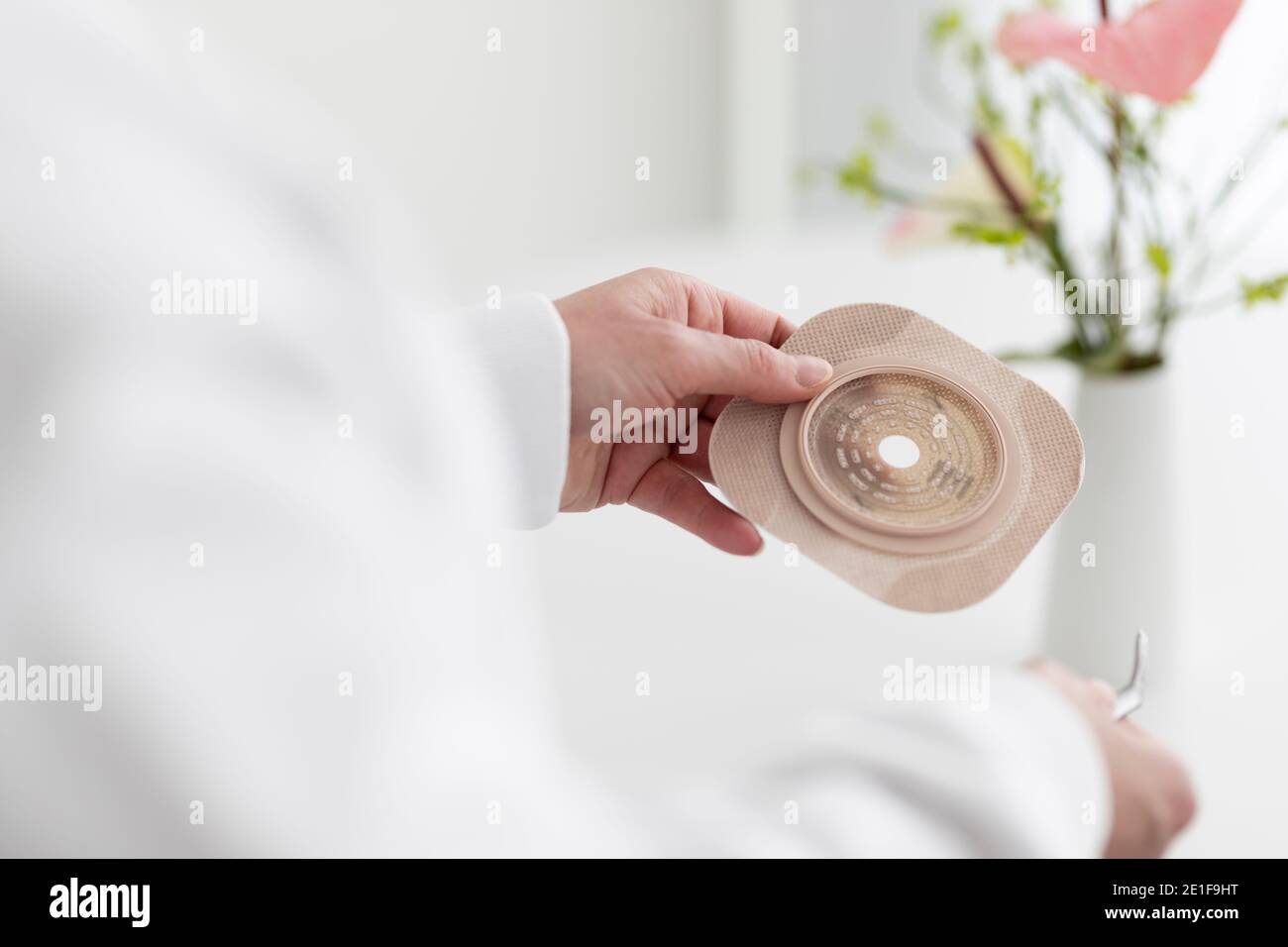 an ostomy therapist prepares an ostomy pouch Stock Photo - Alamy