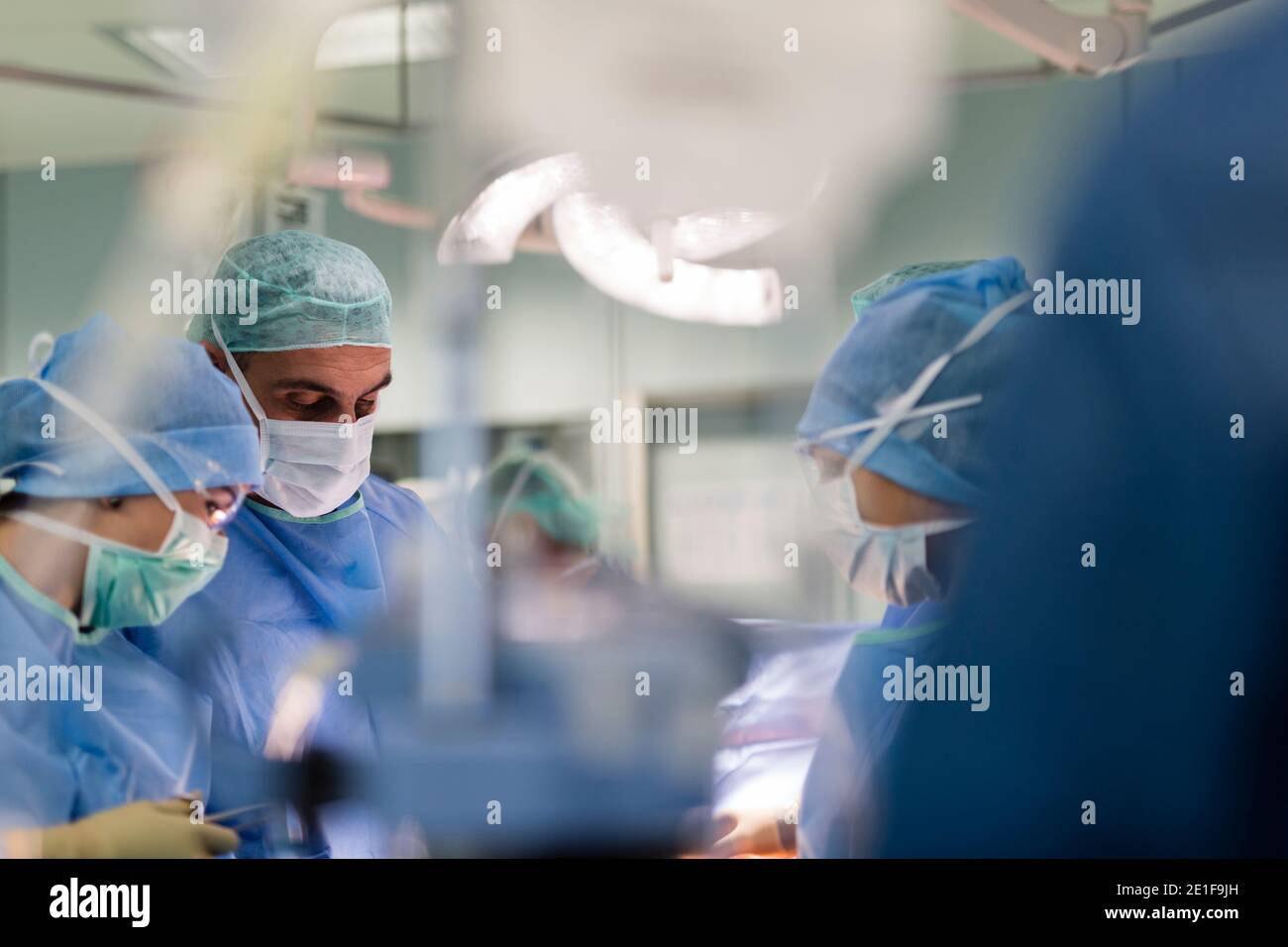 a surgeon in the operating room watching a patient Stock Photo - Alamy
