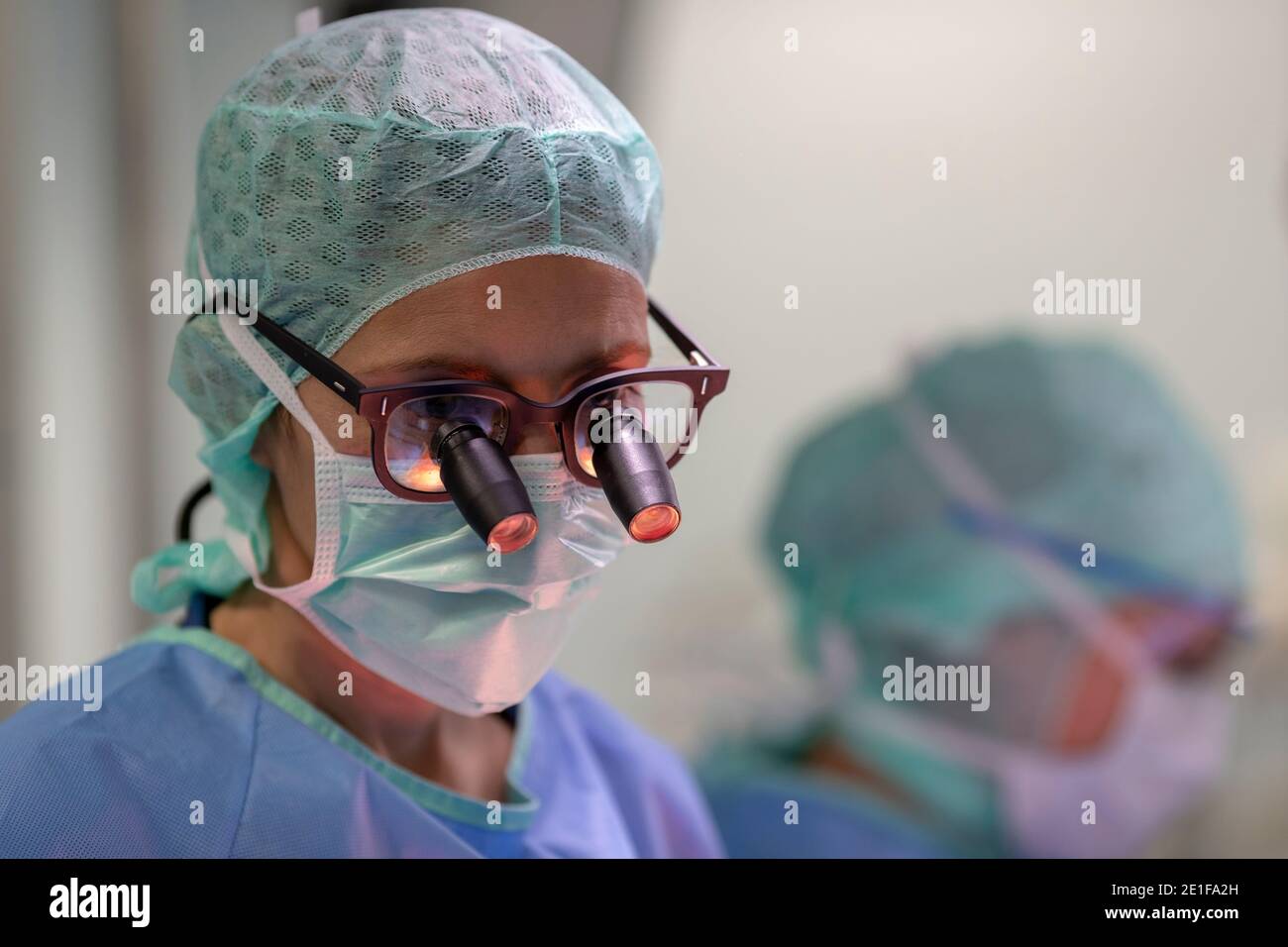 close up view of a heart surgeon wearing his magnifying glasses Stock ...