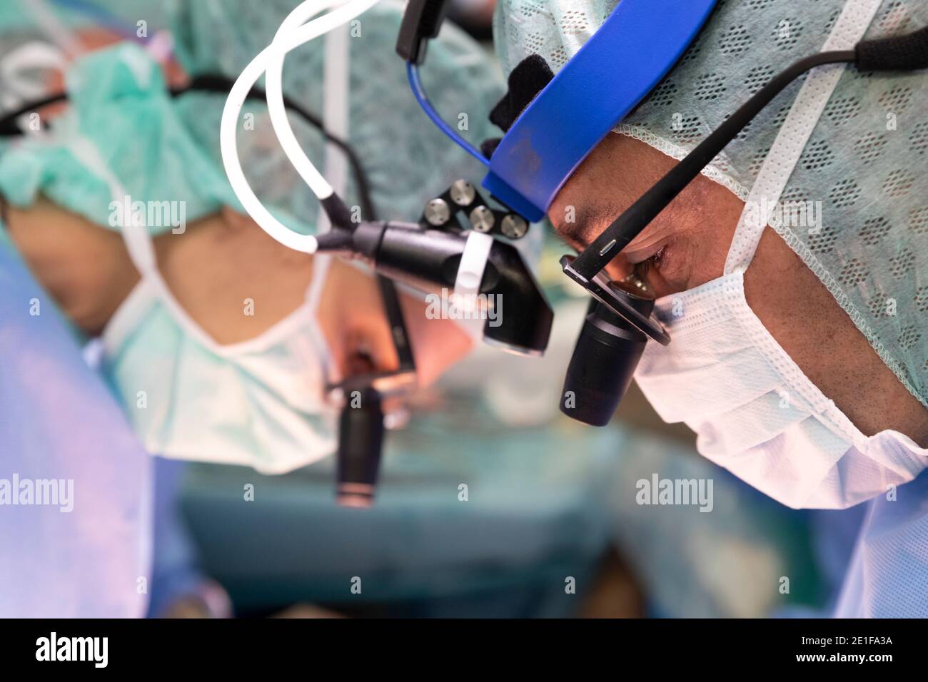 two cardiac surgeons during a surgical intervention Stock Photo - Alamy