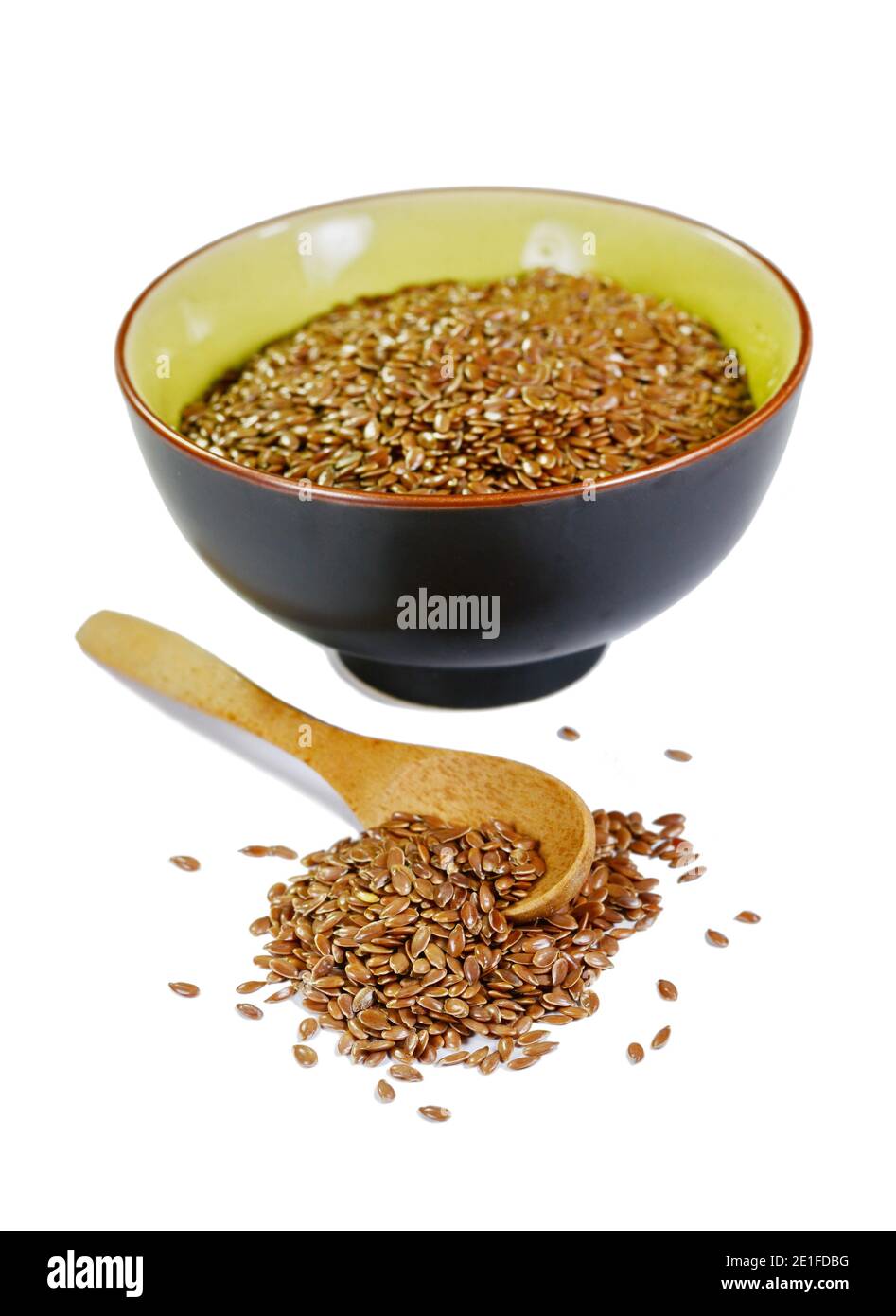 Organic Linseed or Flaxseed (Linum usitatissimum) in a bowl isolated on white background Stock ...