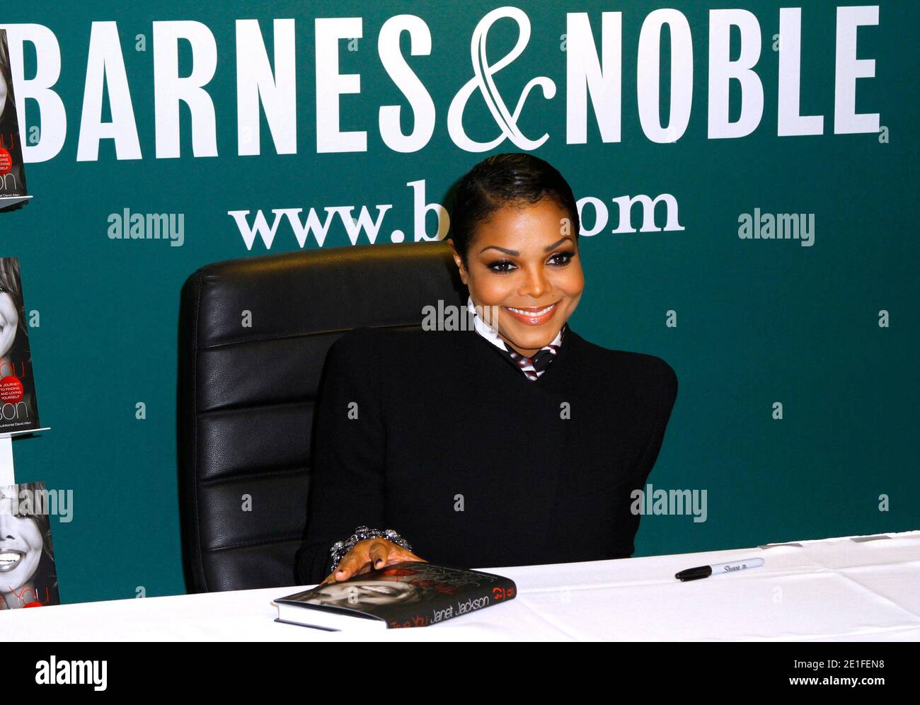 Singer Janet Jackson signing her book "TRUE YOU: A Guide To Finding And ...