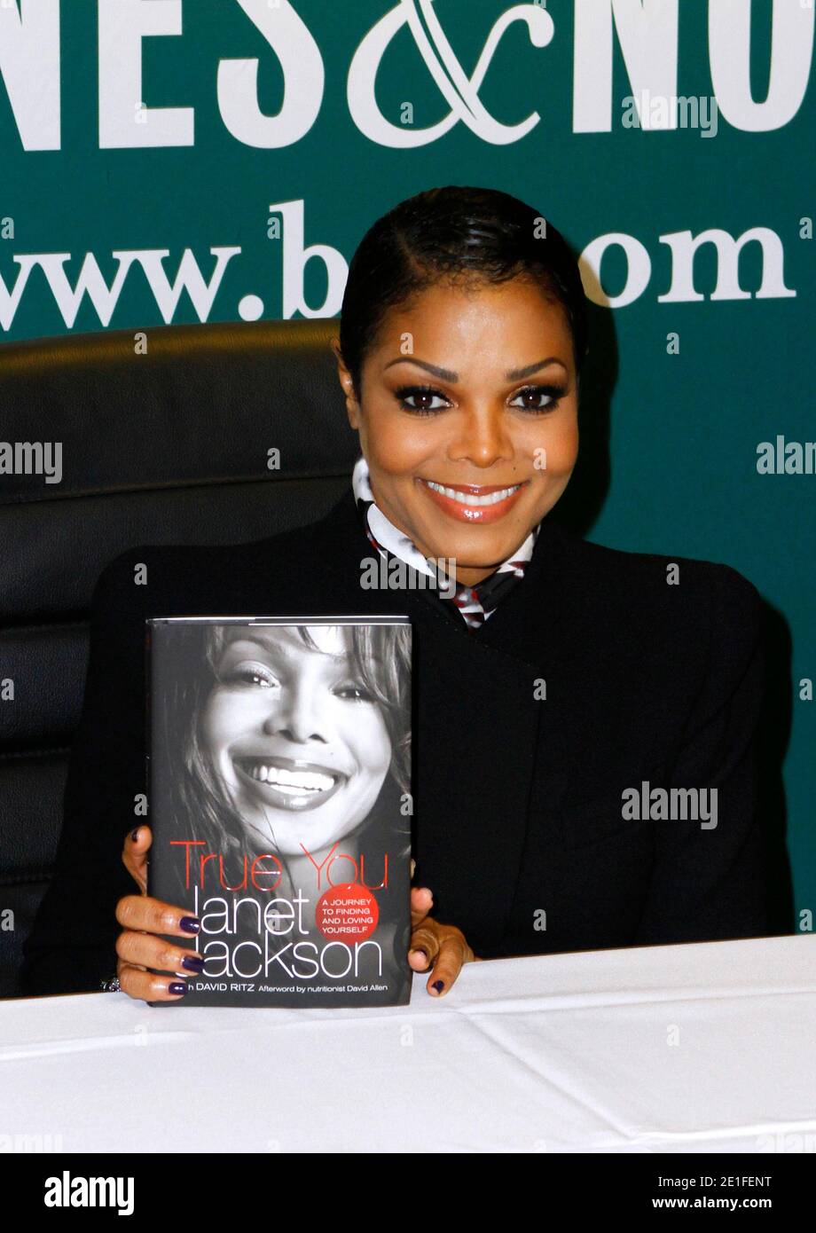 Singer Janet Jackson signing her book "TRUE YOU: A Guide To Finding And ...