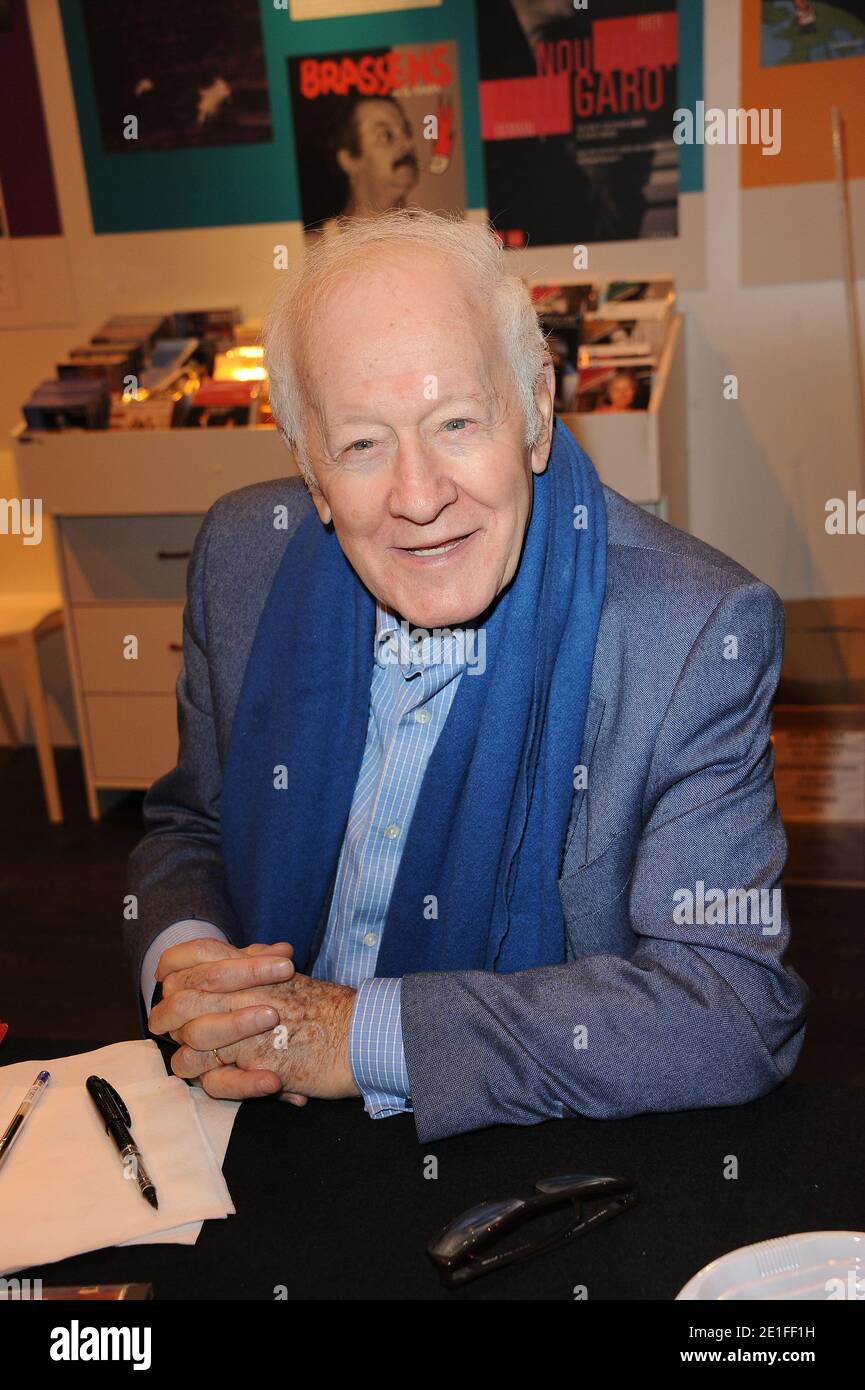 Jacques Chancel signing copies of his book during the Paris Book Fair ...