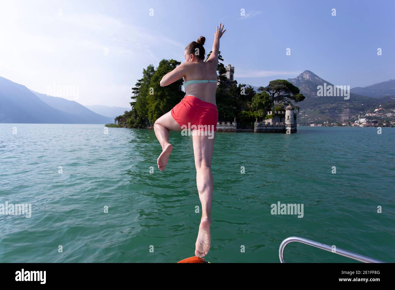 Woman Jumping Off Boat Water High Resolution Stock Photography and ...