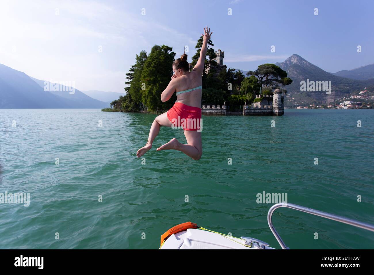 Woman Jumping Off Boat Water High Resolution Stock Photography and ...