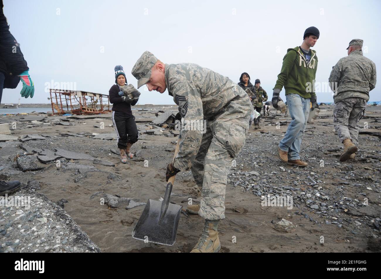 Chief Master Sgt. Matt Wickham, from Eldersburg Md., helps residents ...