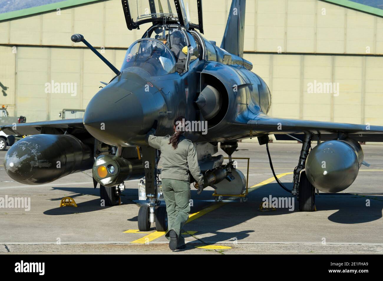 French air force personnel checking French Mirage 2000 jet fighter of ...