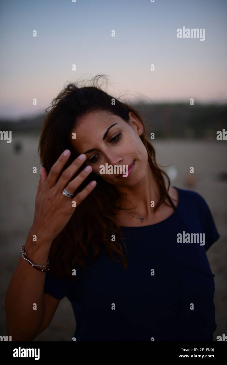 Portrait of attractive caucasian woman on the beach at sunset in Malibu ...